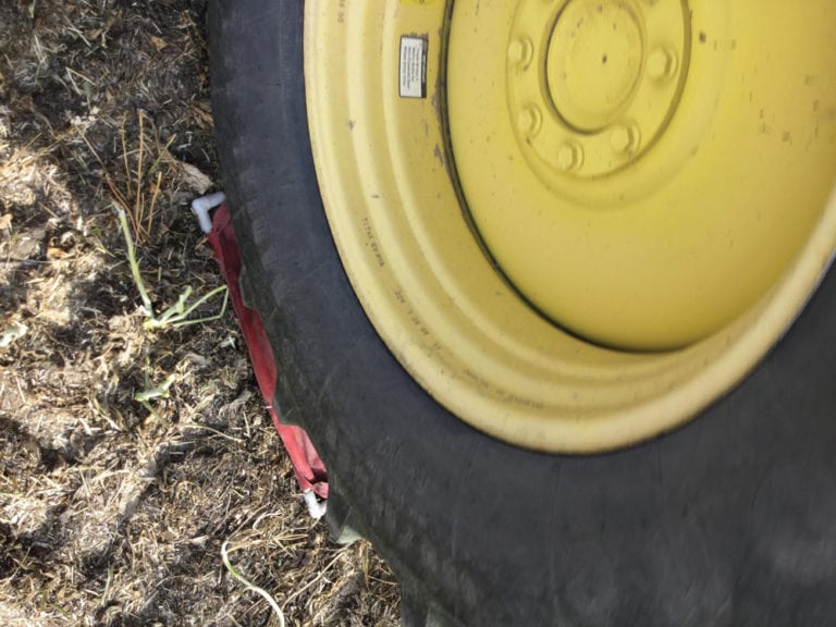 Homemade grain catcher helps farmer fine-tune combine settings
